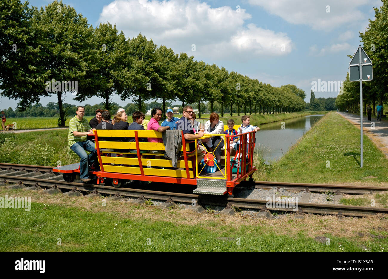Group of people on a Grenzland Draisine traversing the Baroque Garden ...