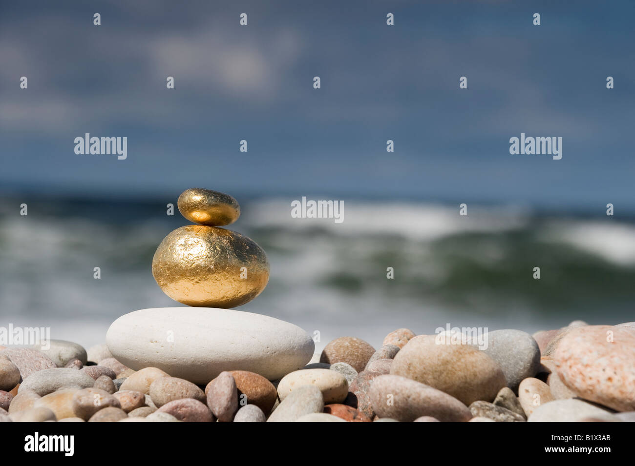 Golden pebbles on a beach at the . Findhorn beach, Morayshire, Scotland ...