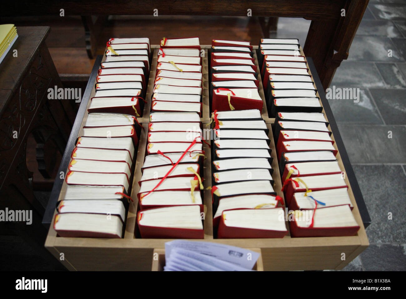 box with songbooks in german church Stock Photo - Alamy