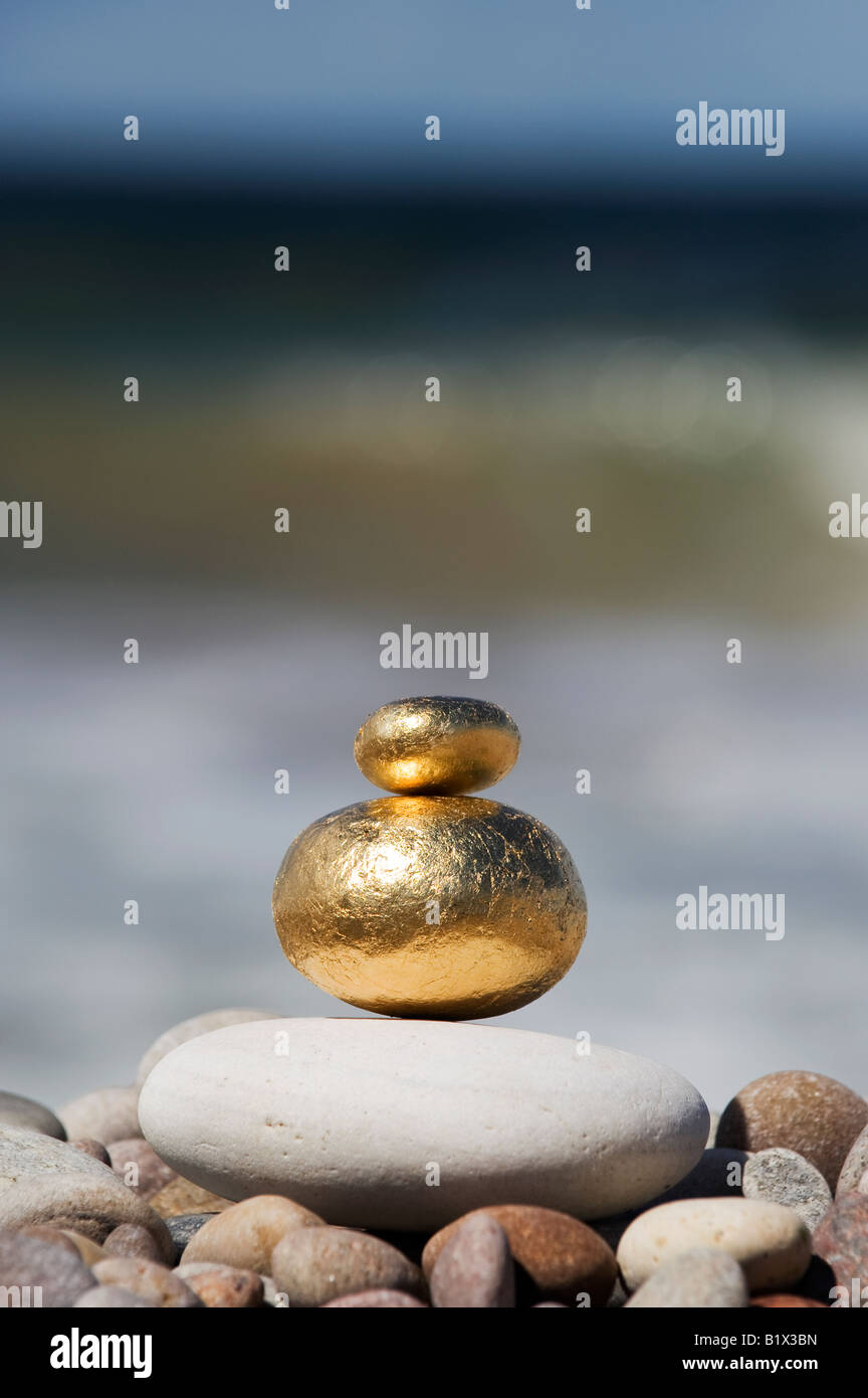 Golden pebbles on a beach at the . Findhorn beach, Morayshire, Scotland ...
