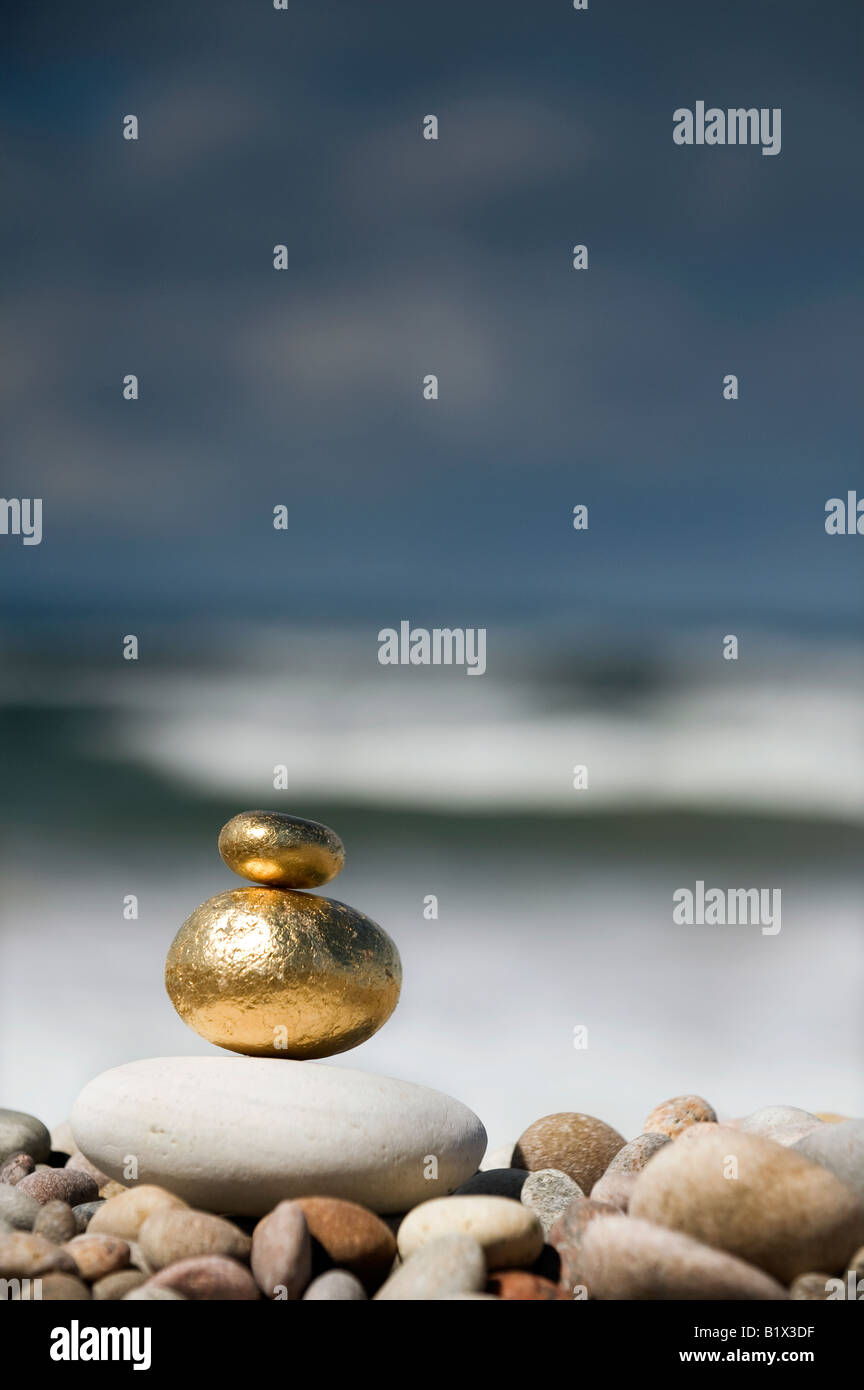 Golden pebbles on a beach at the . Findhorn beach, Morayshire, Scotland ...
