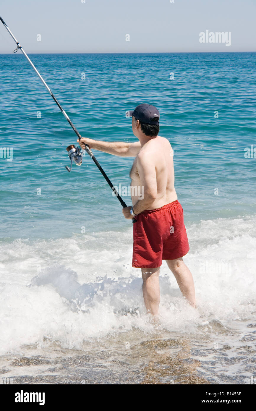 Man sea fishing Stock Photo - Alamy
