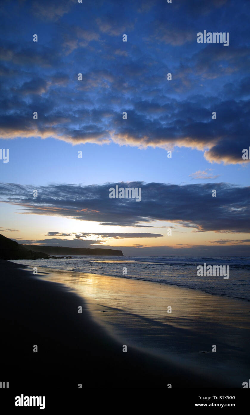 Whitby beach at sunset looking towards Sandsend Stock Photo - Alamy