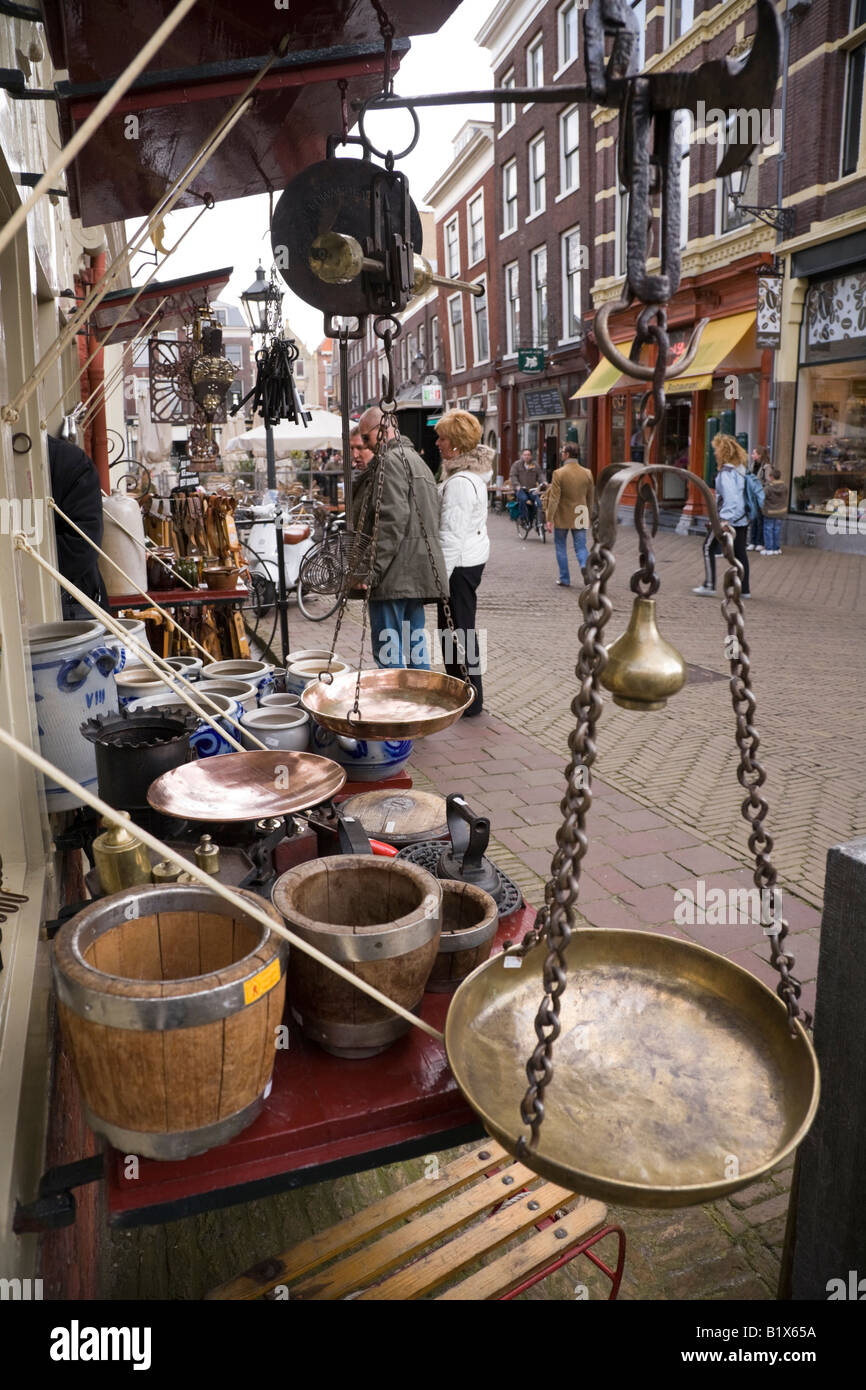 Antique shop with items for sale on the pavement, in Delft. Netherlands ...