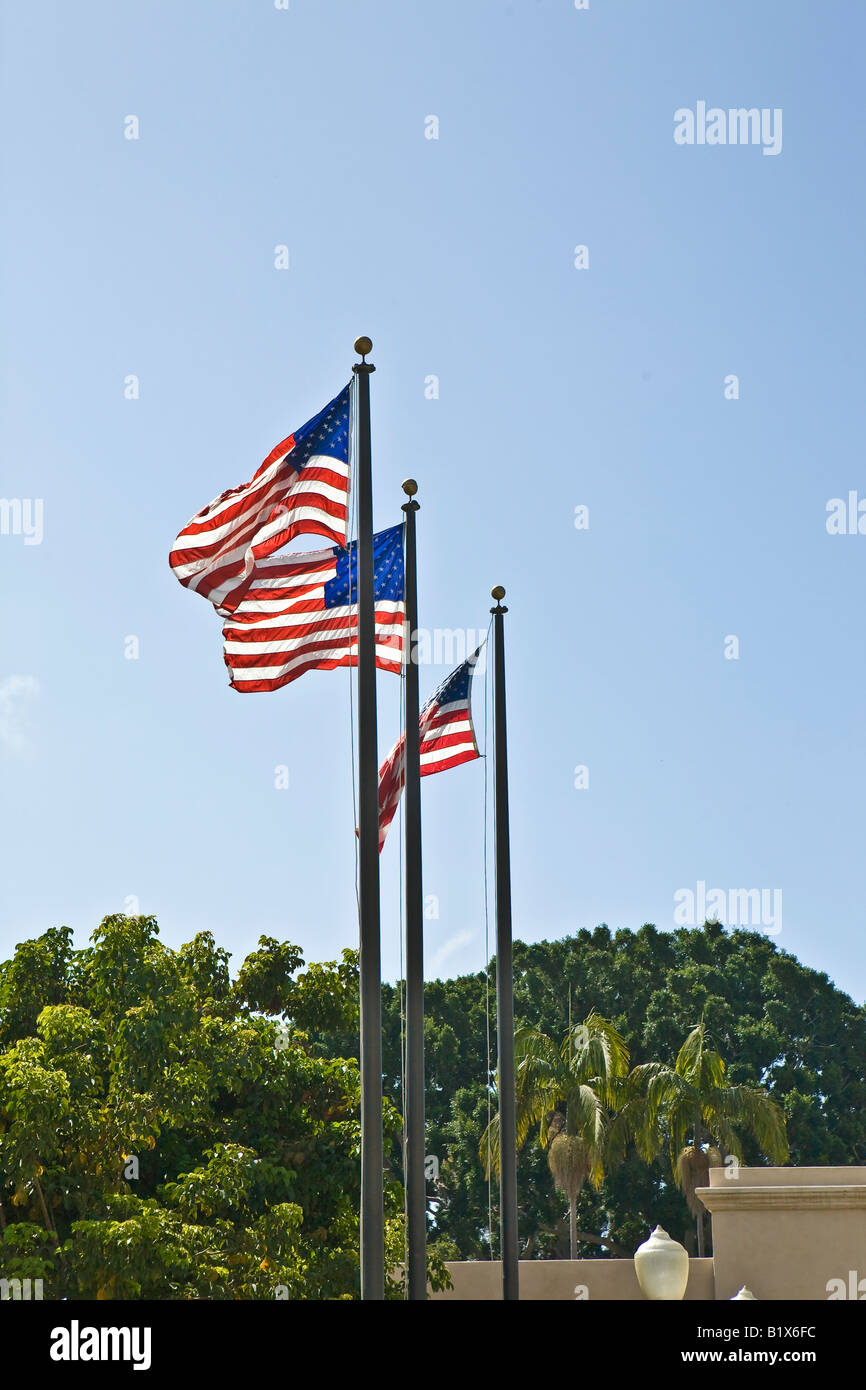 Three American flags against the sky Stock Photo - Alamy