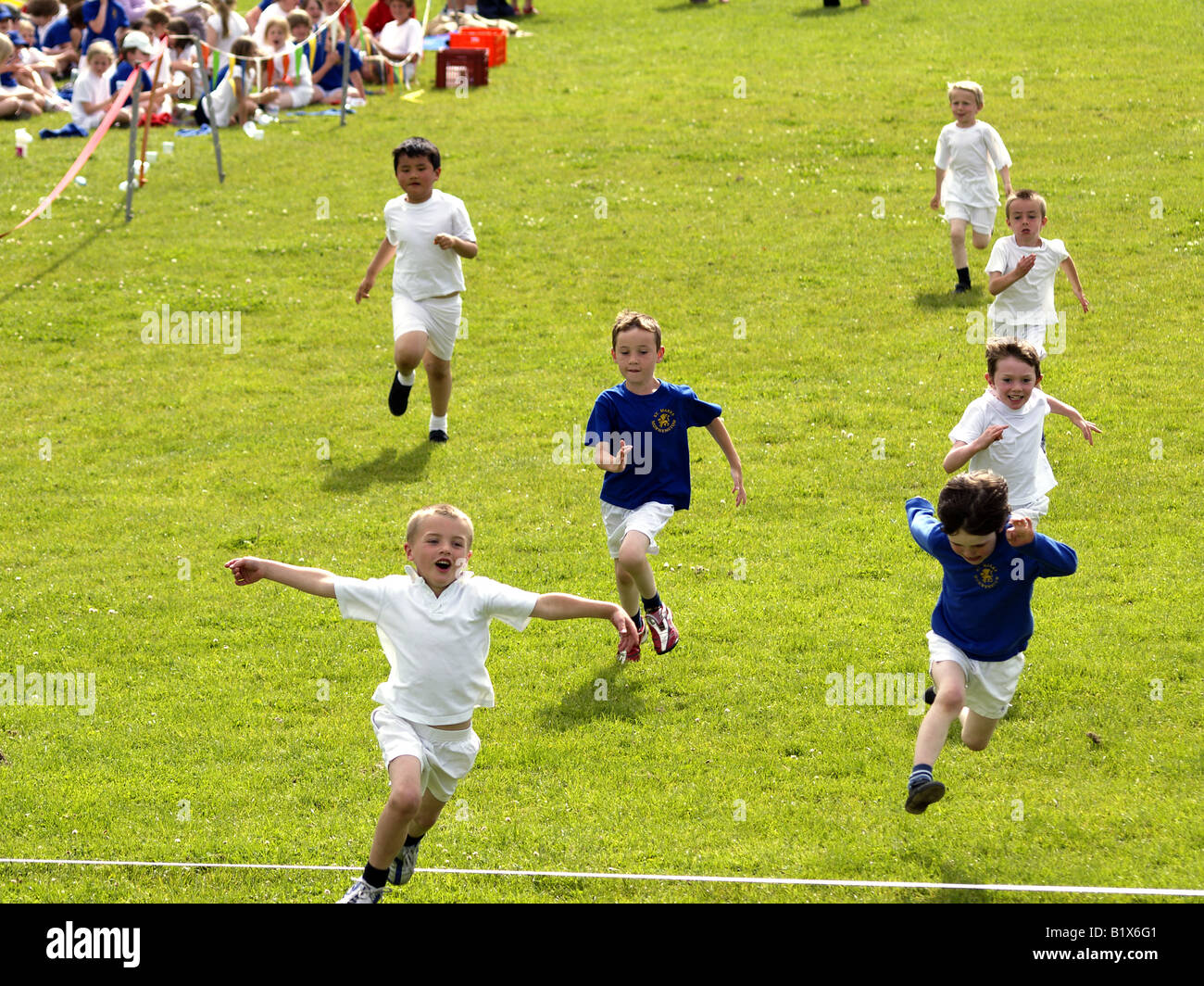 Boy winning race running hi-res stock photography and images - Alamy