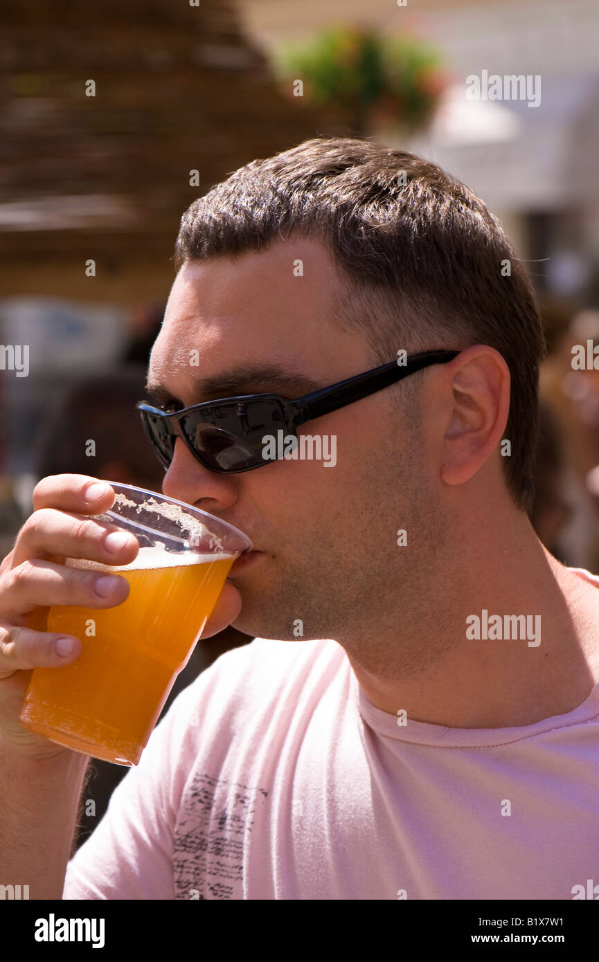 Man drinking honey beer, Food fair on Nowy Swiat Street offering Polish ...