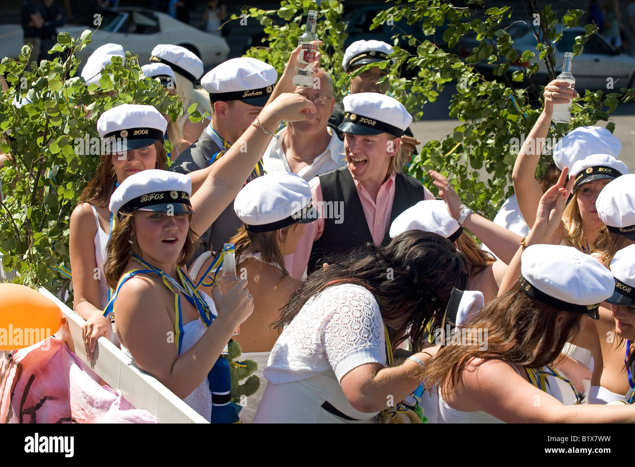 Students ride on truck platform during traditional celebration of High ...