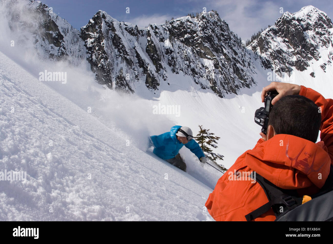 Ian Coble making a turn as Bryce Phillips shoots a photo Stock Photo ...