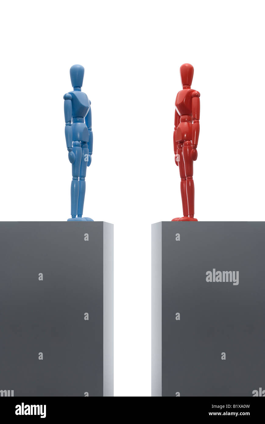 Two human mannequin figures face each other across a gap Stock Photo ...