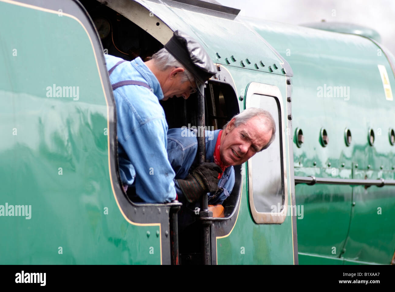 Engine driver and fireman aboard the steam locomotive the Lord Nelson ...