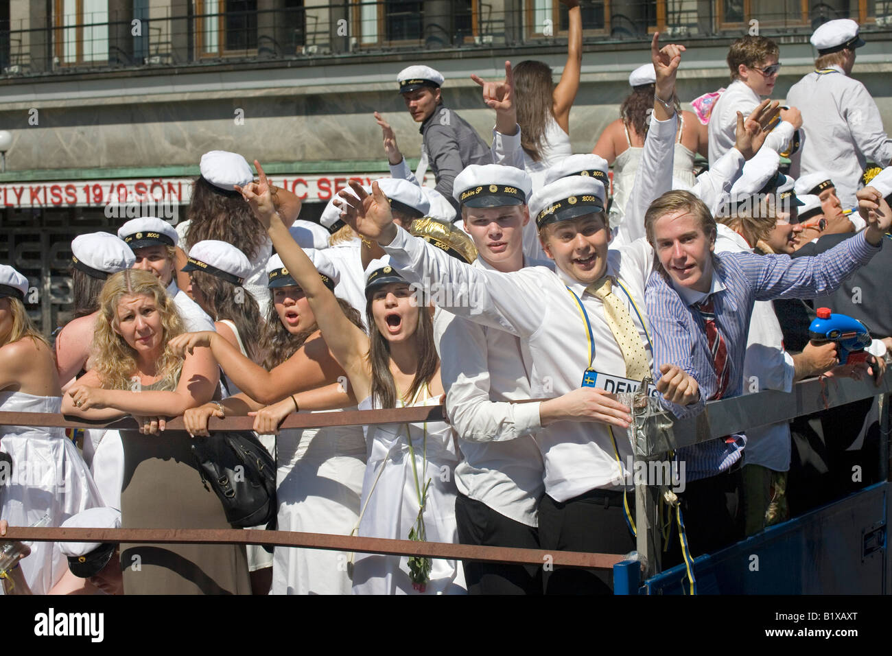 Students ride on truck platform during traditional celebration of High ...