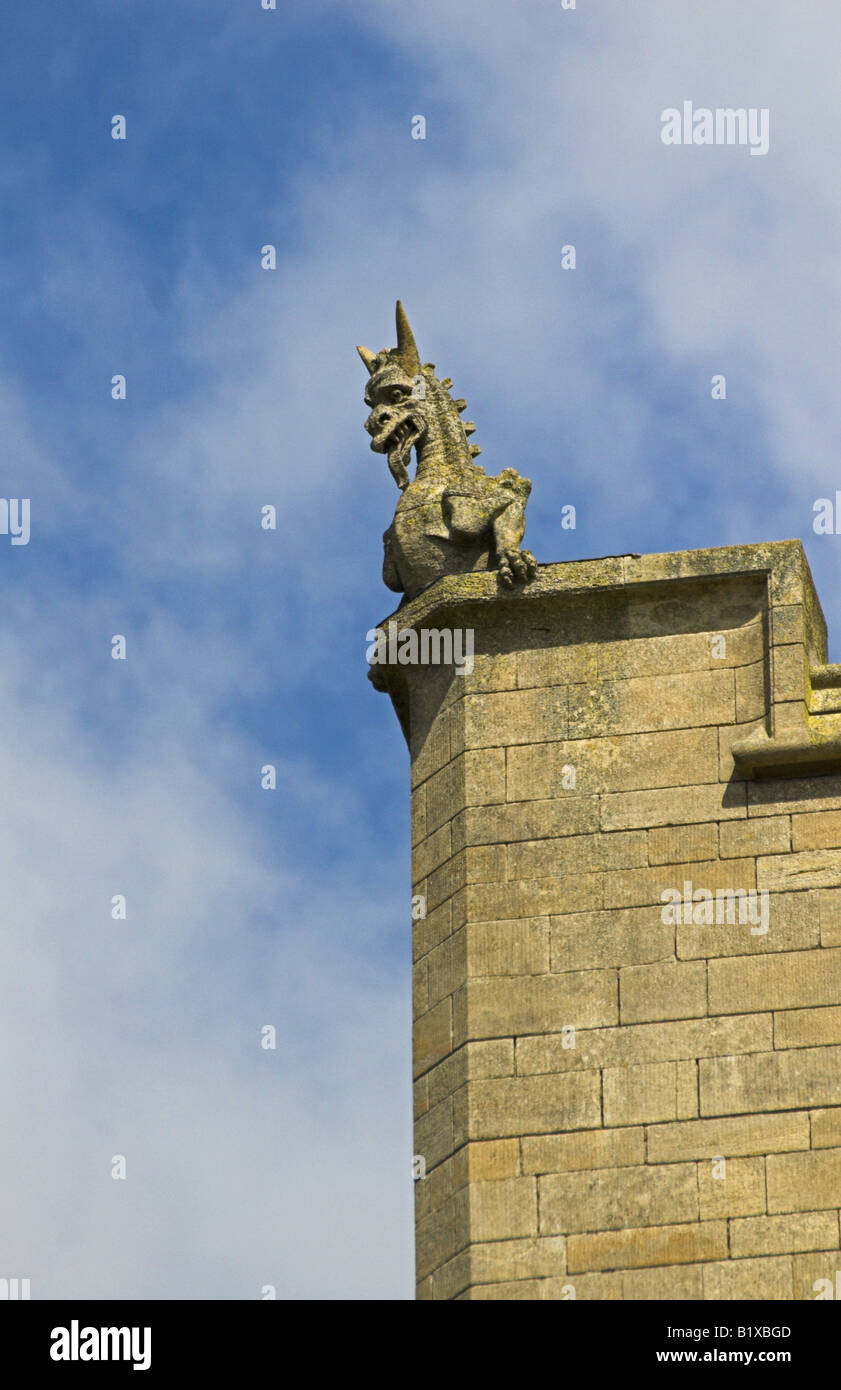 gargoyle looking over tower at woburn church Stock Photo - Alamy