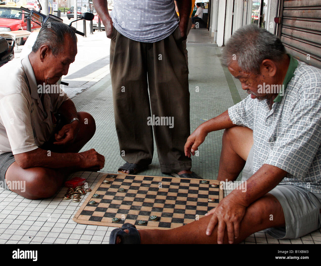 Stock editorial photo of men playing checkers in the street of ...