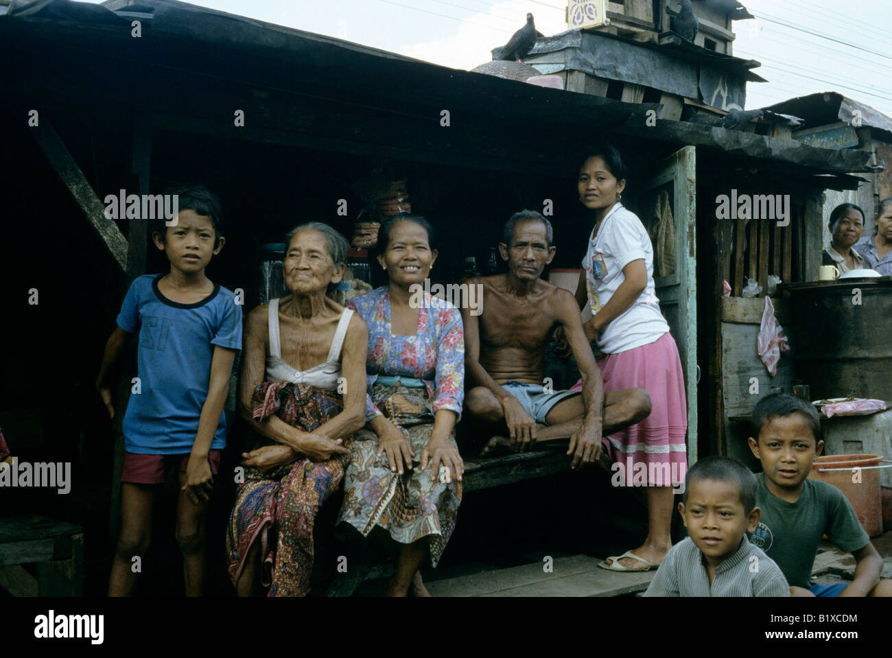 Family in the Jakarta Shanty town Java Indonesia Stock Photo - Alamy