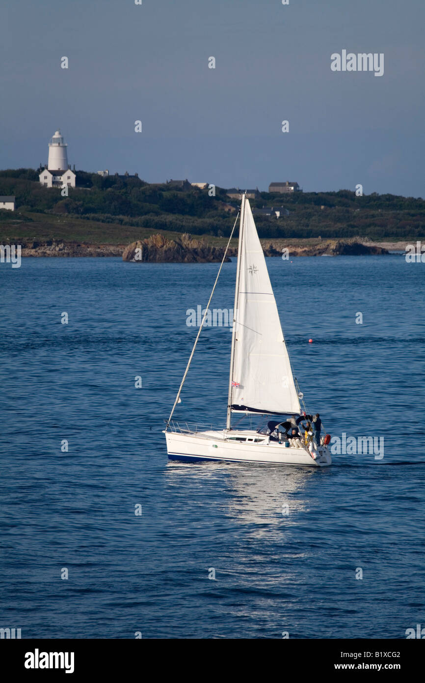 yacht passing st agnes Isles of Scilly Stock Photo - Alamy