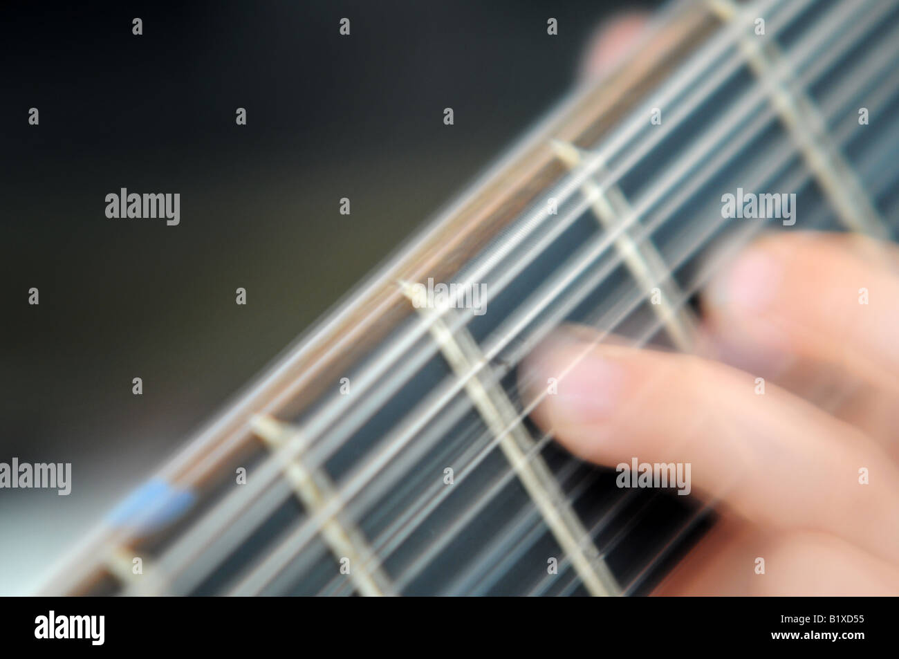 Man playing classical guitar with fingers Stock Photo - Alamy