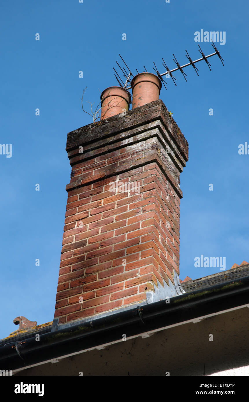Red brick chimney stack with chimney pots Stock Photo - Alamy