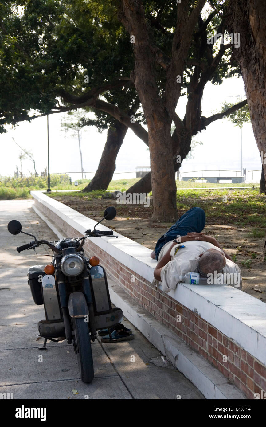 Sleeper in a temple compound Taiwan Stock Photo - Alamy