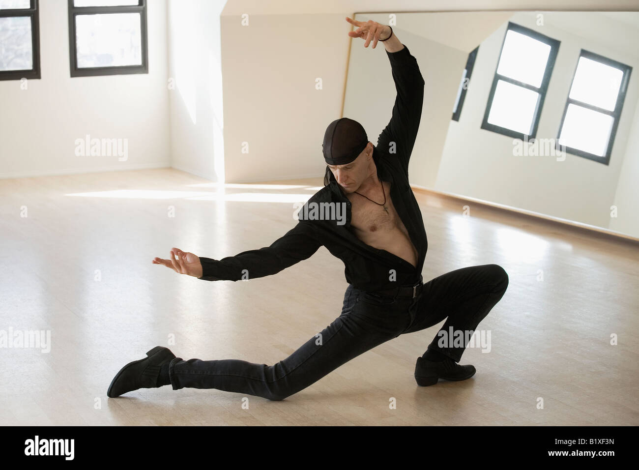 Mid adult man practicing Spanish ballet Stock Photo - Alamy
