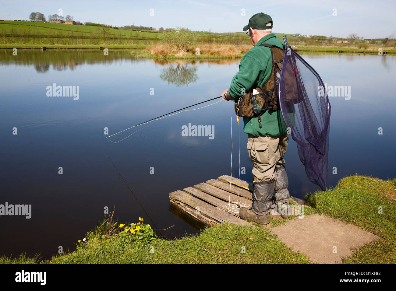 man fishing for trout using rod and line, Ayrshire, Scotland Stock ...