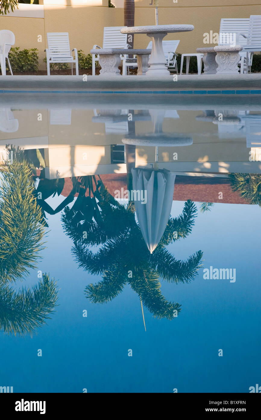 Reflection of a tourist resort in a swimming pool Stock Photo - Alamy
