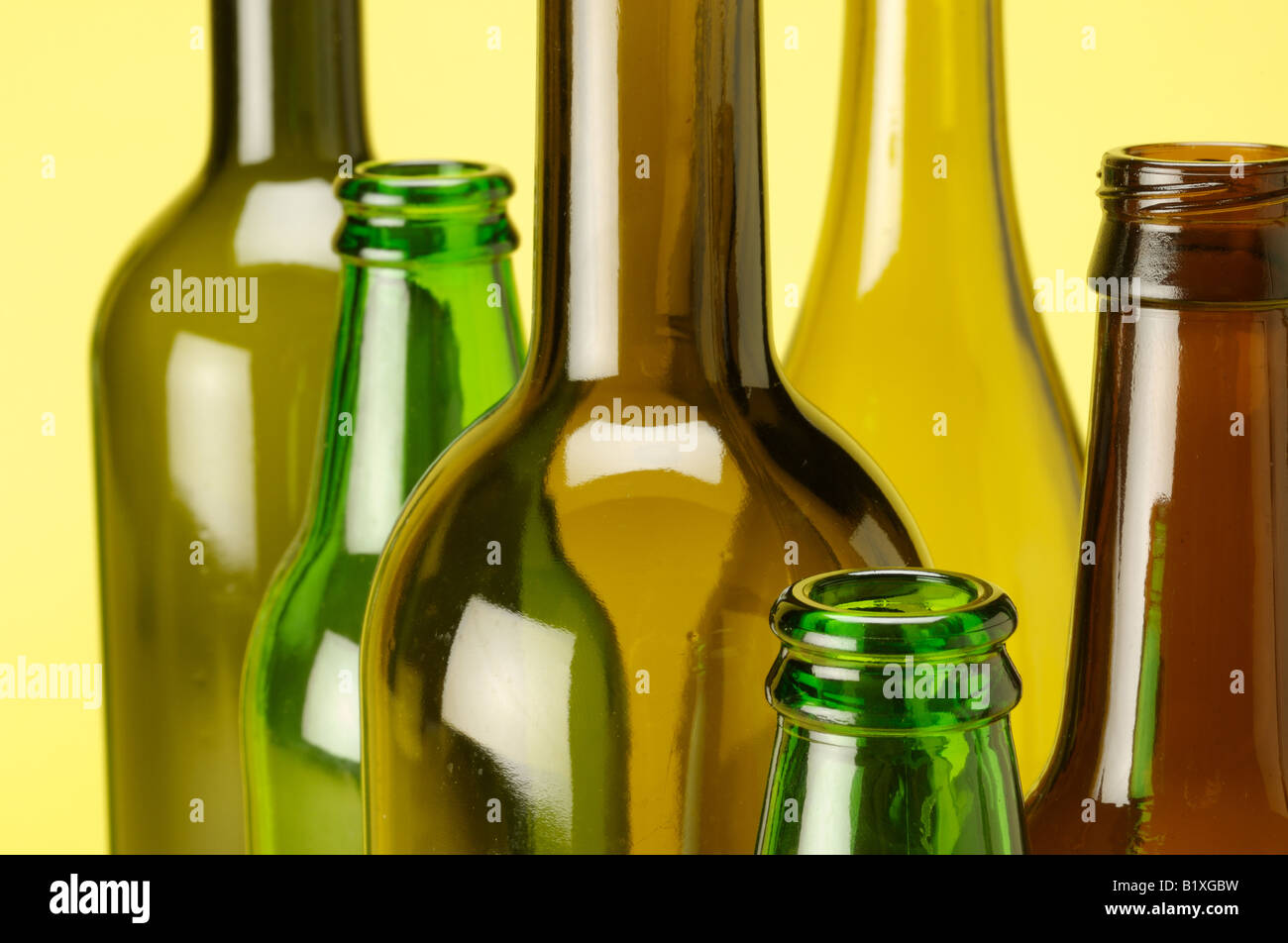 A section of colored empty glass bottles Stock Photo - Alamy