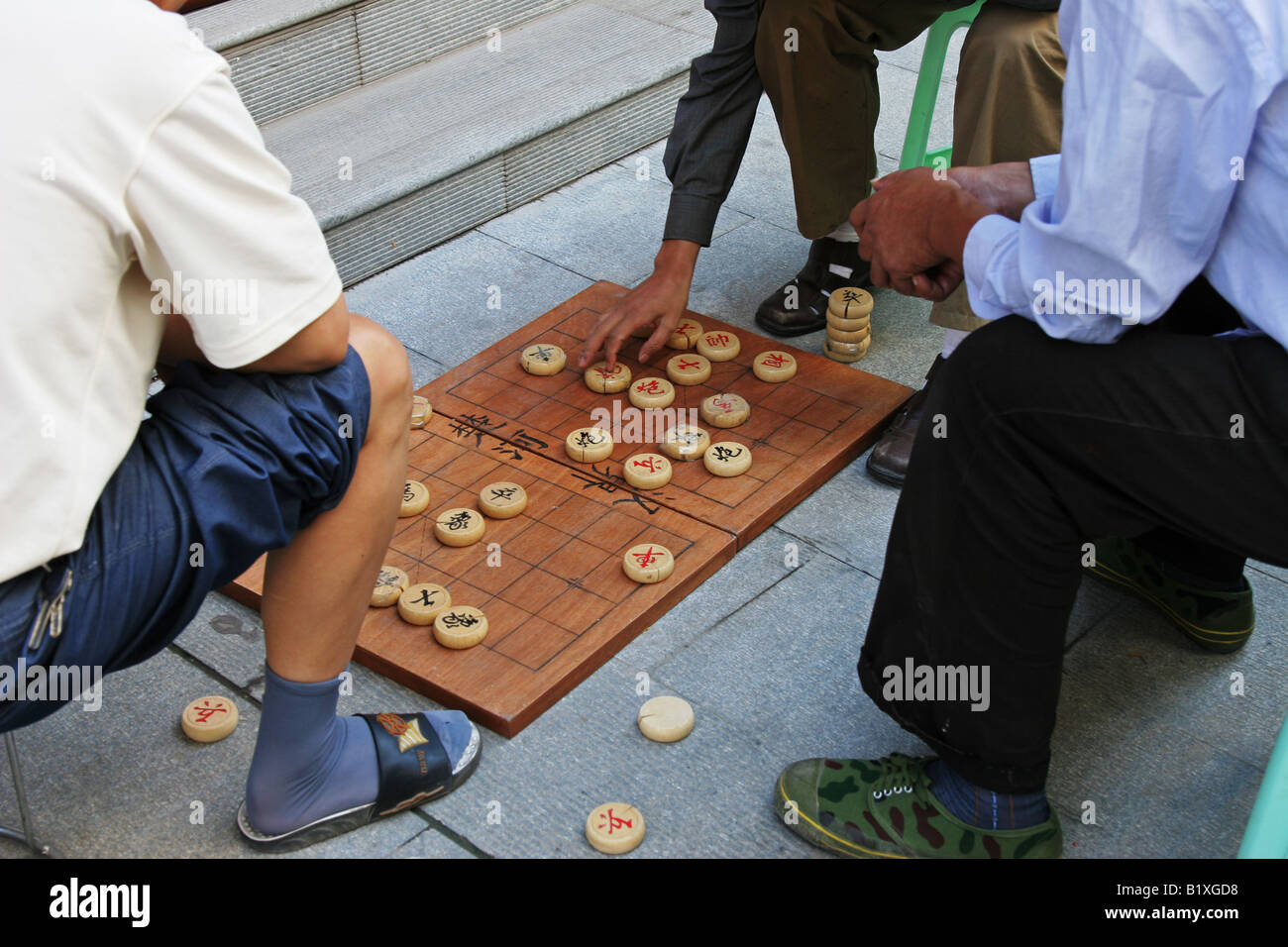 Mens game in china Stock Photo - Alamy