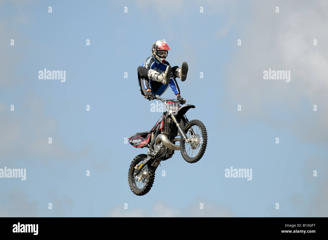 Freestyle motocross stunt rider Stock Photo - Alamy
