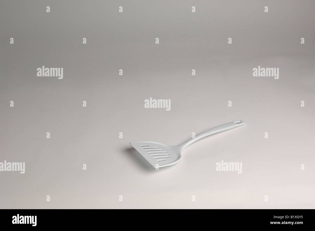 White plastic spatula Stock Photo - Alamy