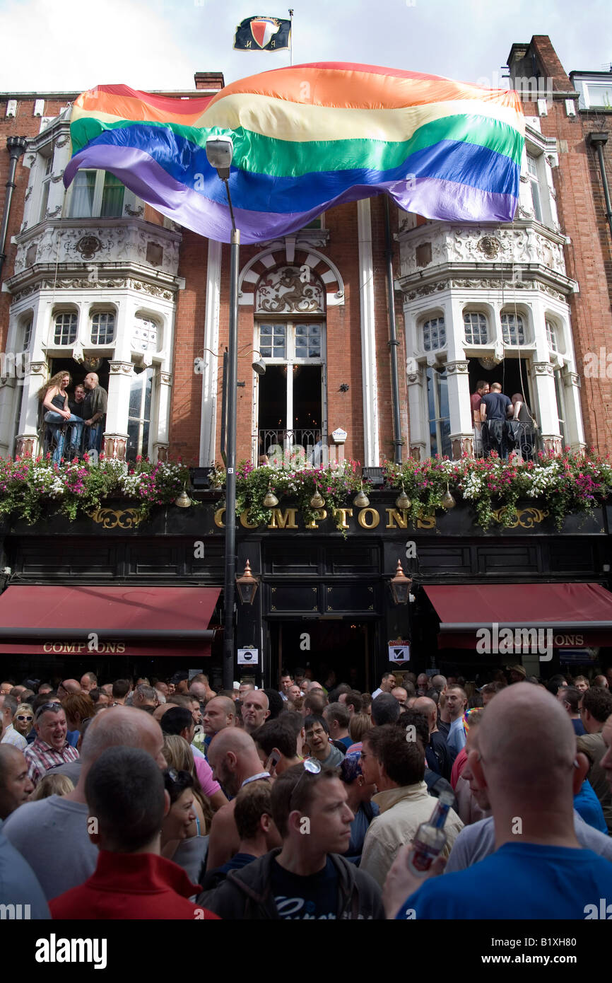 Crowd of people at Comptons pub during the gay pride festival London ...