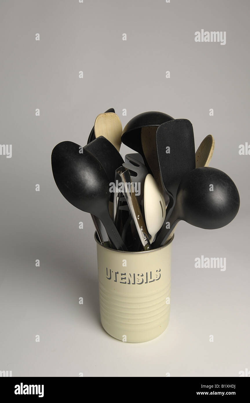 Kitchen utensils stacked in a display can Stock Photo - Alamy