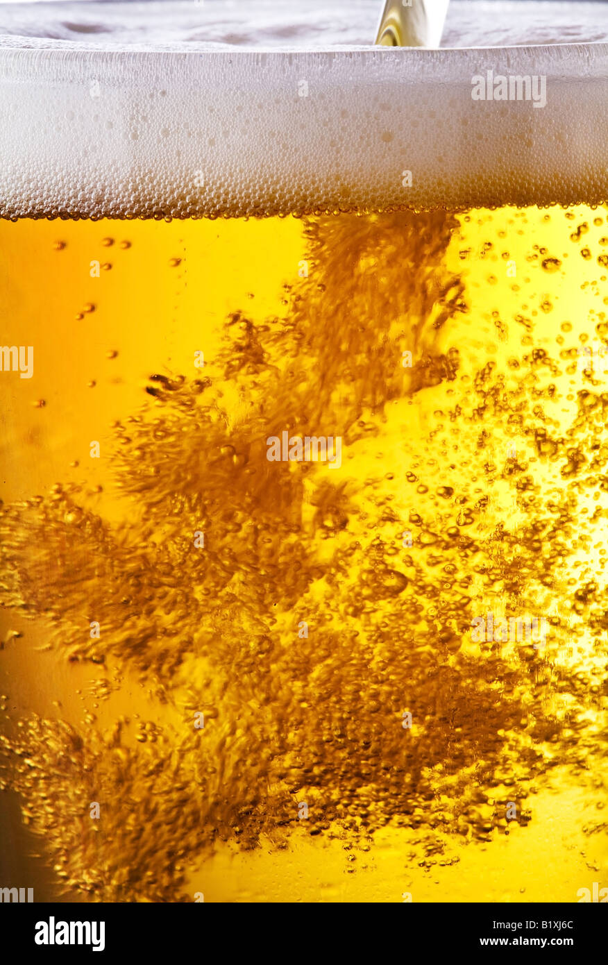 Pouring of beer Stock Photo - Alamy