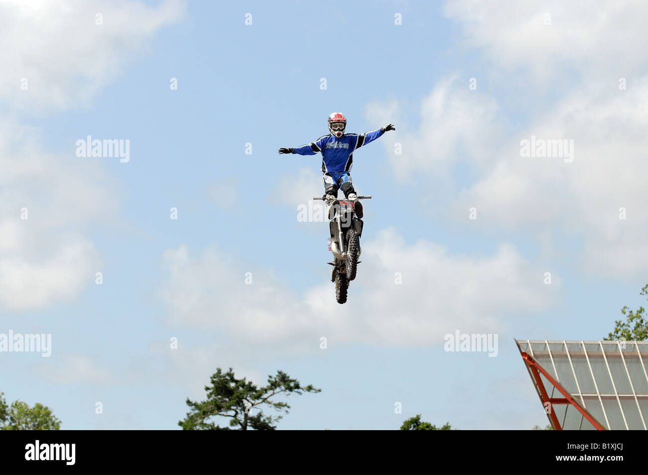 Freestyle motocross stunt rider Stock Photo - Alamy