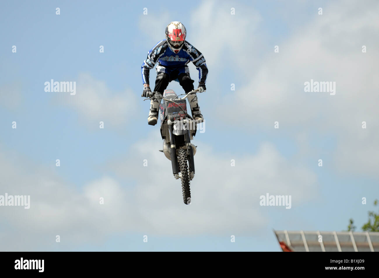 Freestyle motocross stunt rider Stock Photo - Alamy