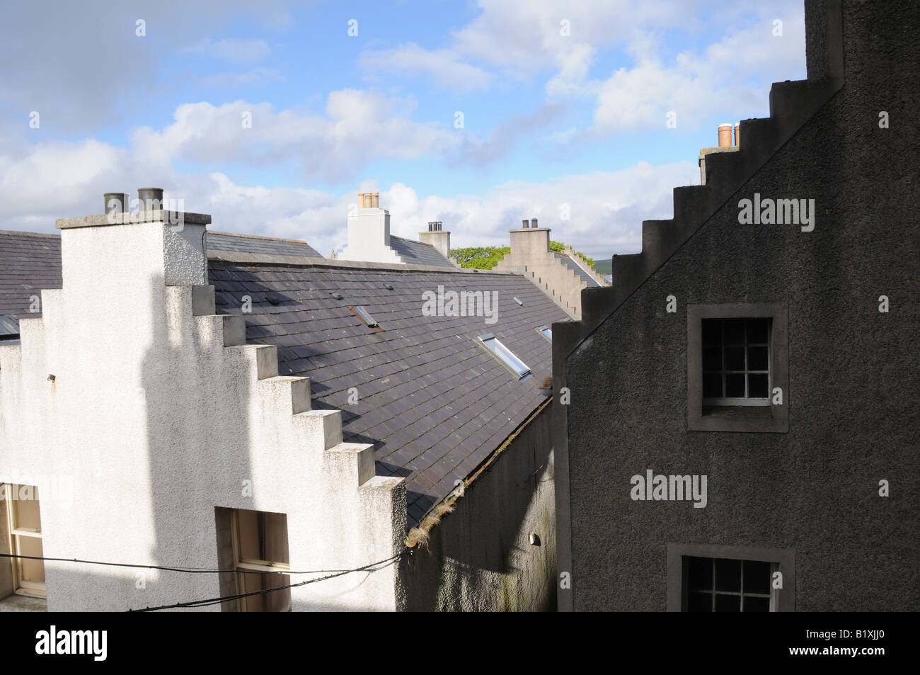 Crow-stepped roof lines on houses in Kirkwall, the capital of the ...