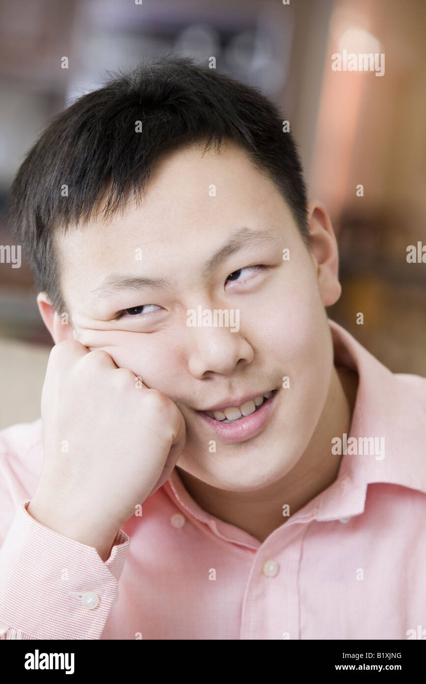 Close-up of a teenage boy thinking Stock Photo - Alamy
