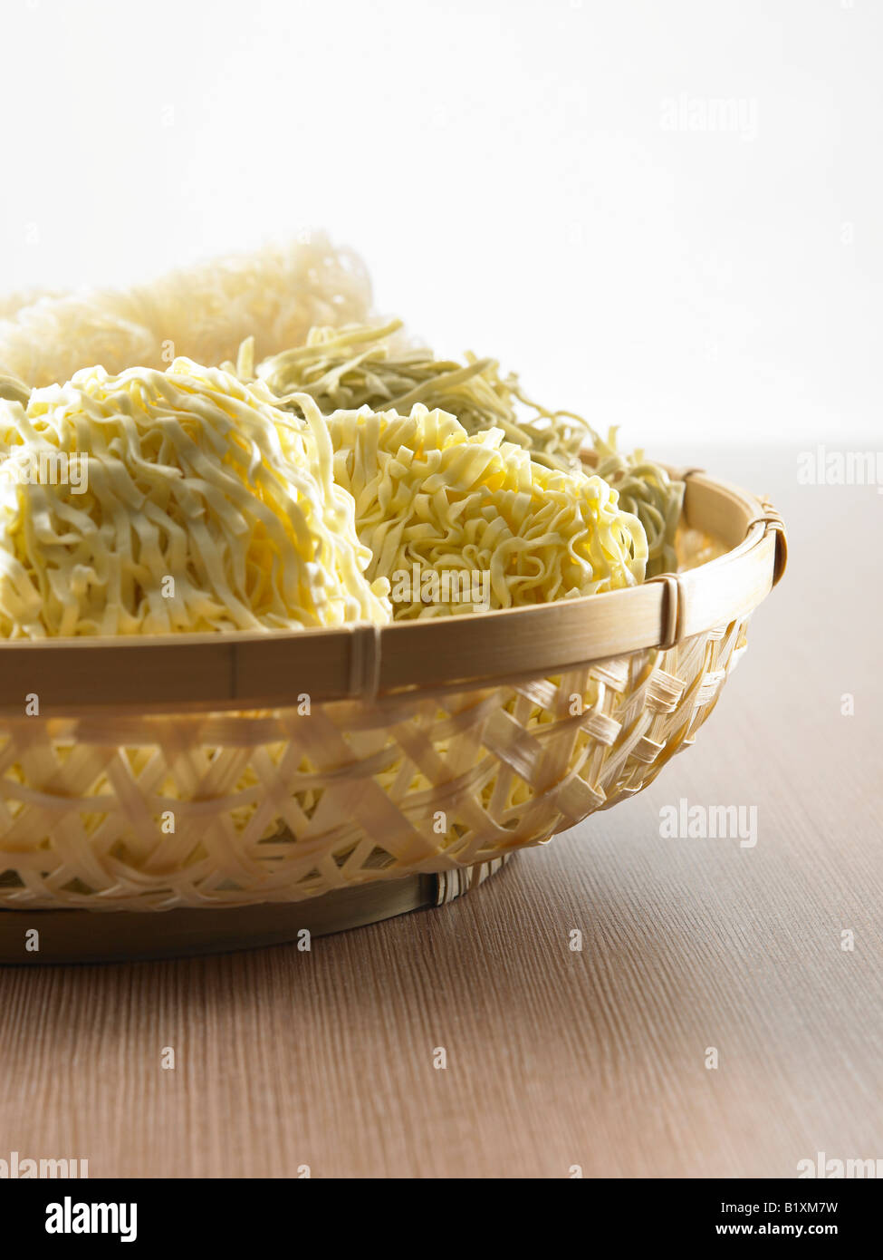 a basket full of dried noodle Stock Photo - Alamy