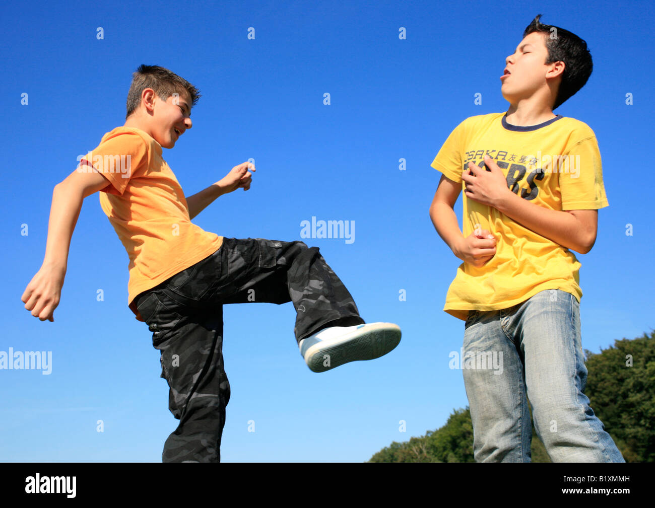 Children Kicking Each Other