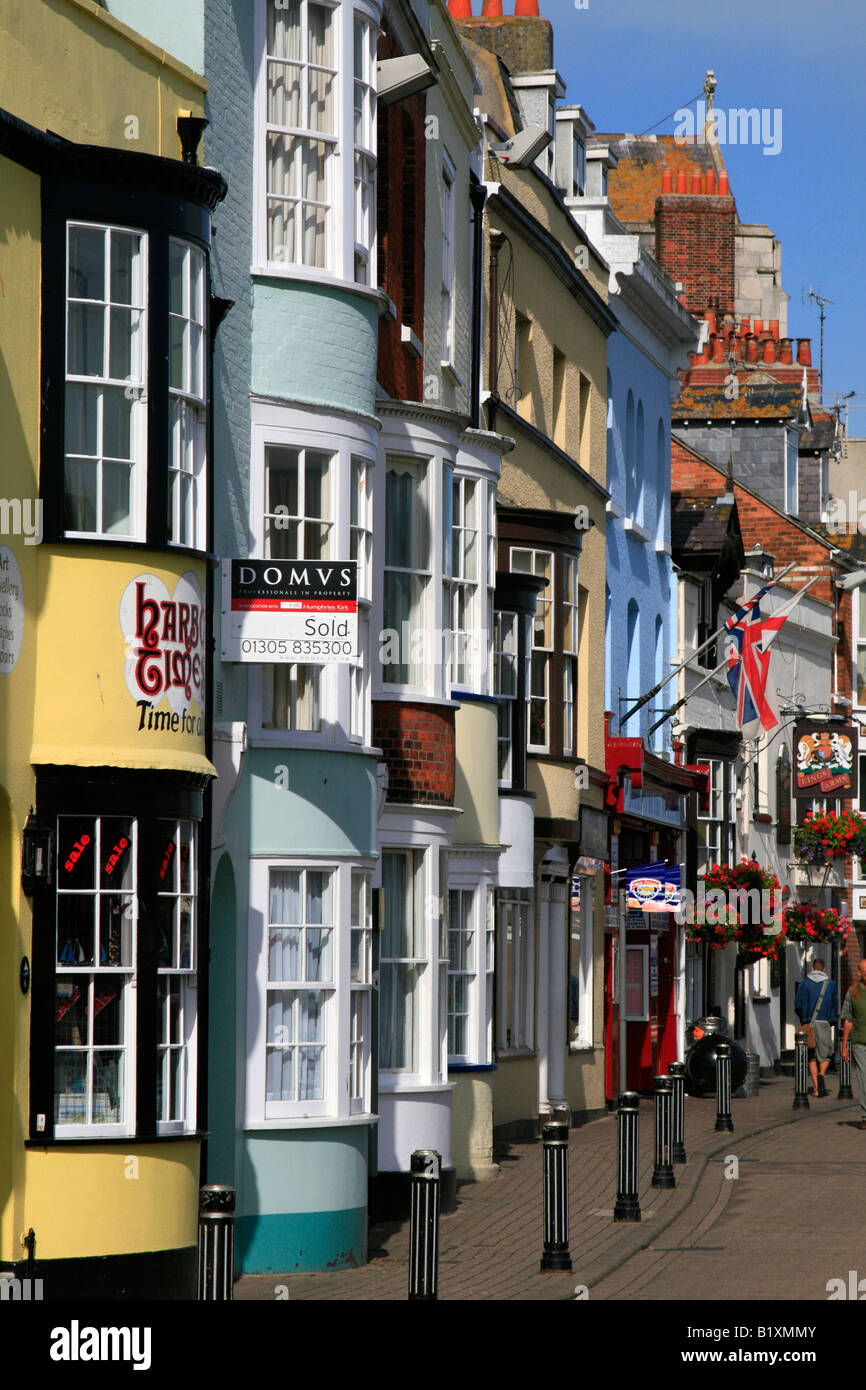 line of pretty coloured harbour town houses weymouth dorset england uk ...