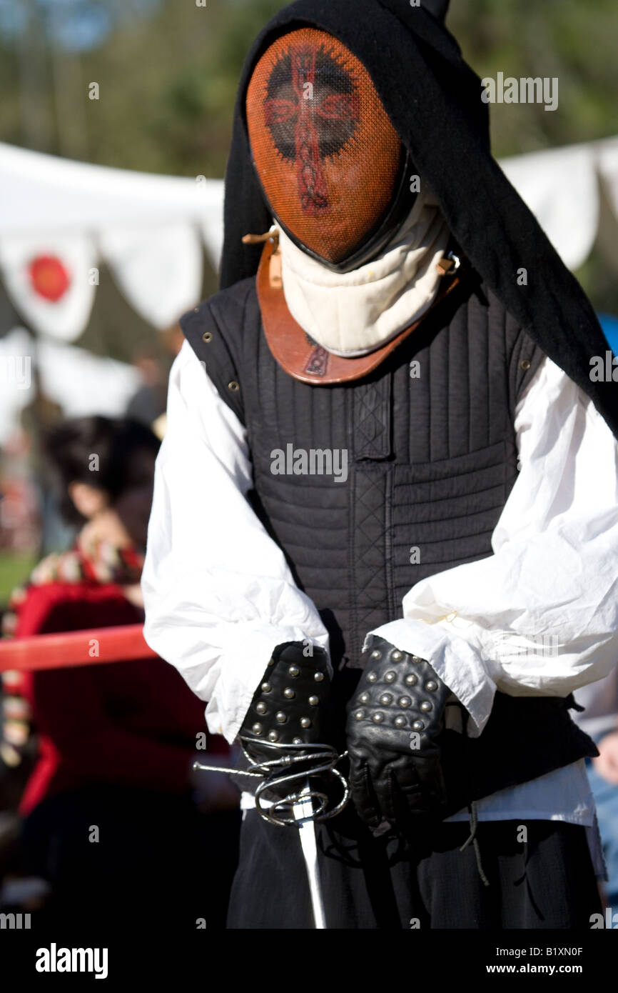 Man fencing at medival games Stock Photo - Alamy