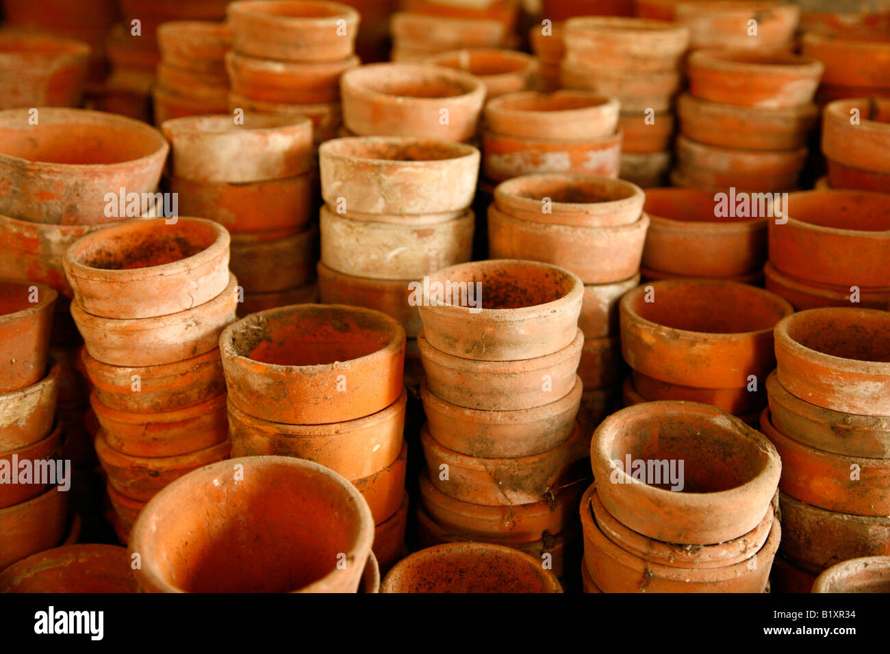 Old Plant flower pots Stacked Stock Photo - Alamy
