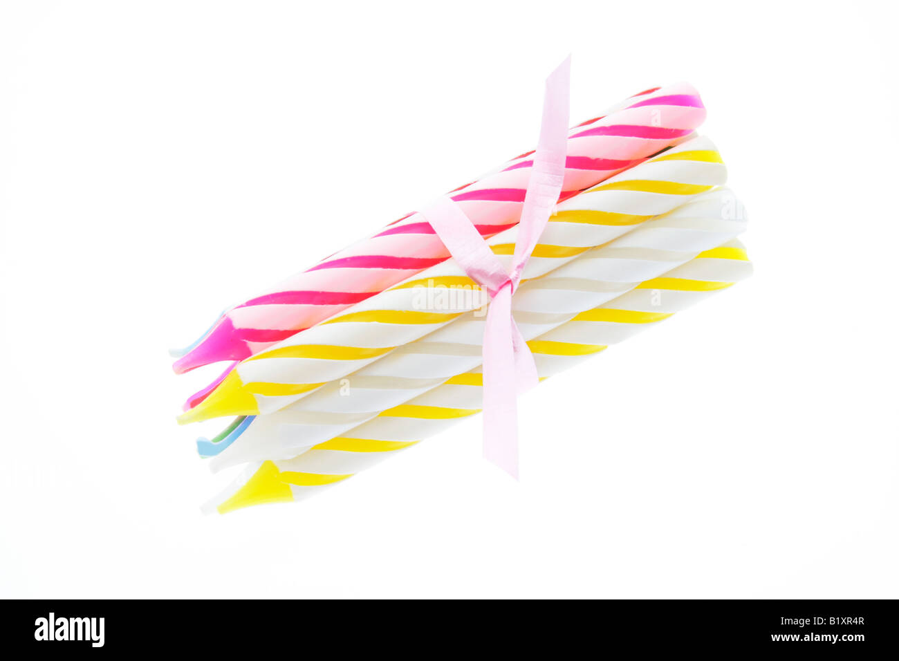 Birthday Candles Tied with Pink Ribbon Stock Photo - Alamy