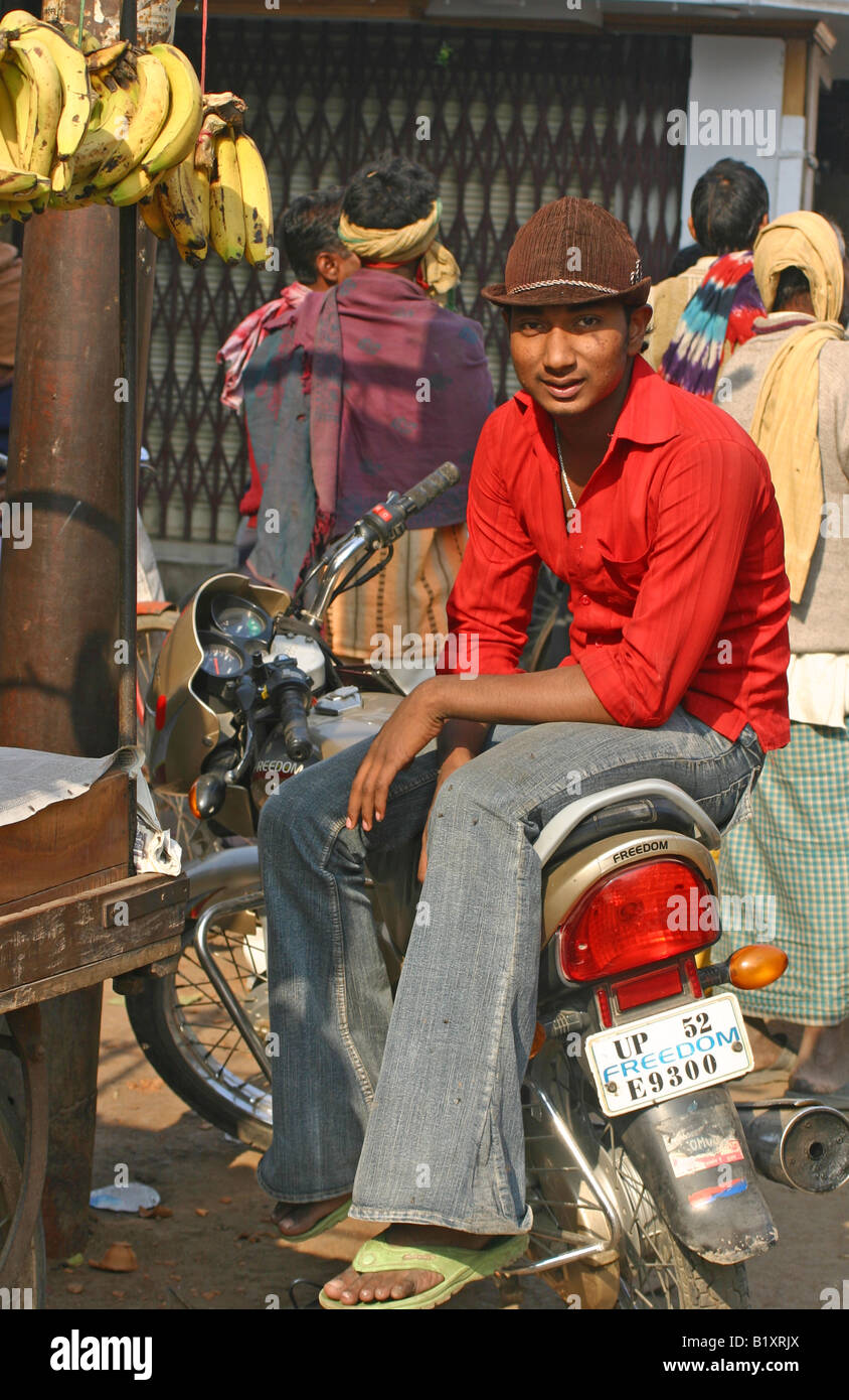 Mr Cool posing on a motorbike in the streets of varanasi Stock Photo ...