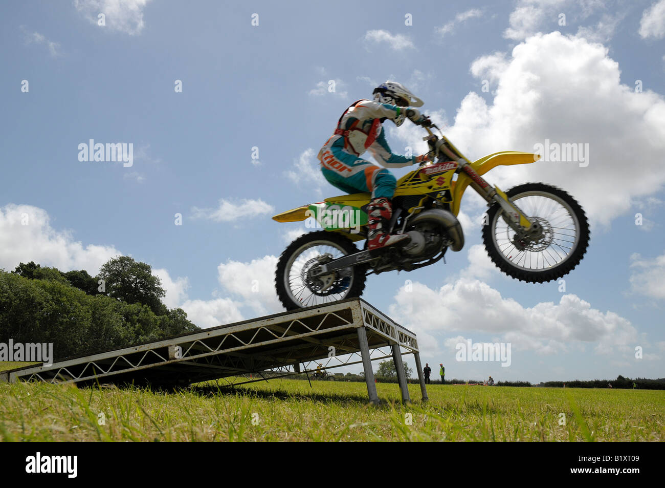 jumping a ramp grasstrack racing Stock Photo - Alamy