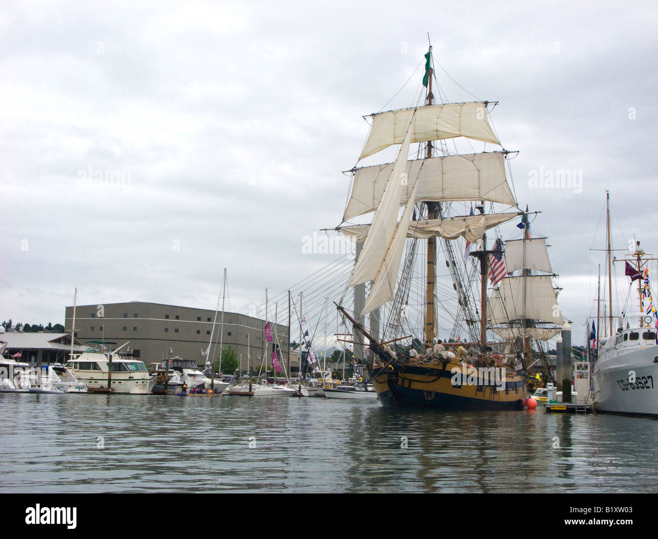 Hawaiian Chieftain tall ship pulkling away from dock under sail in ...