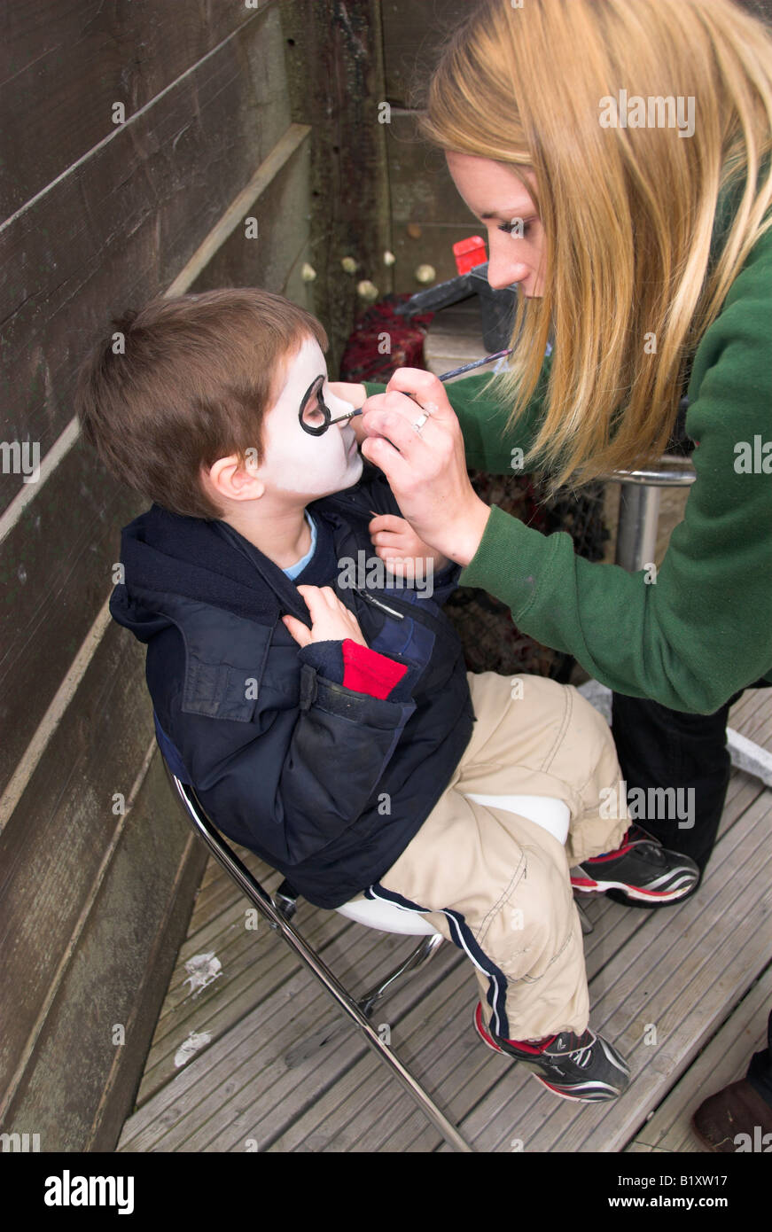 Young Boy Having His Face Painted Stock Photo - Alamy