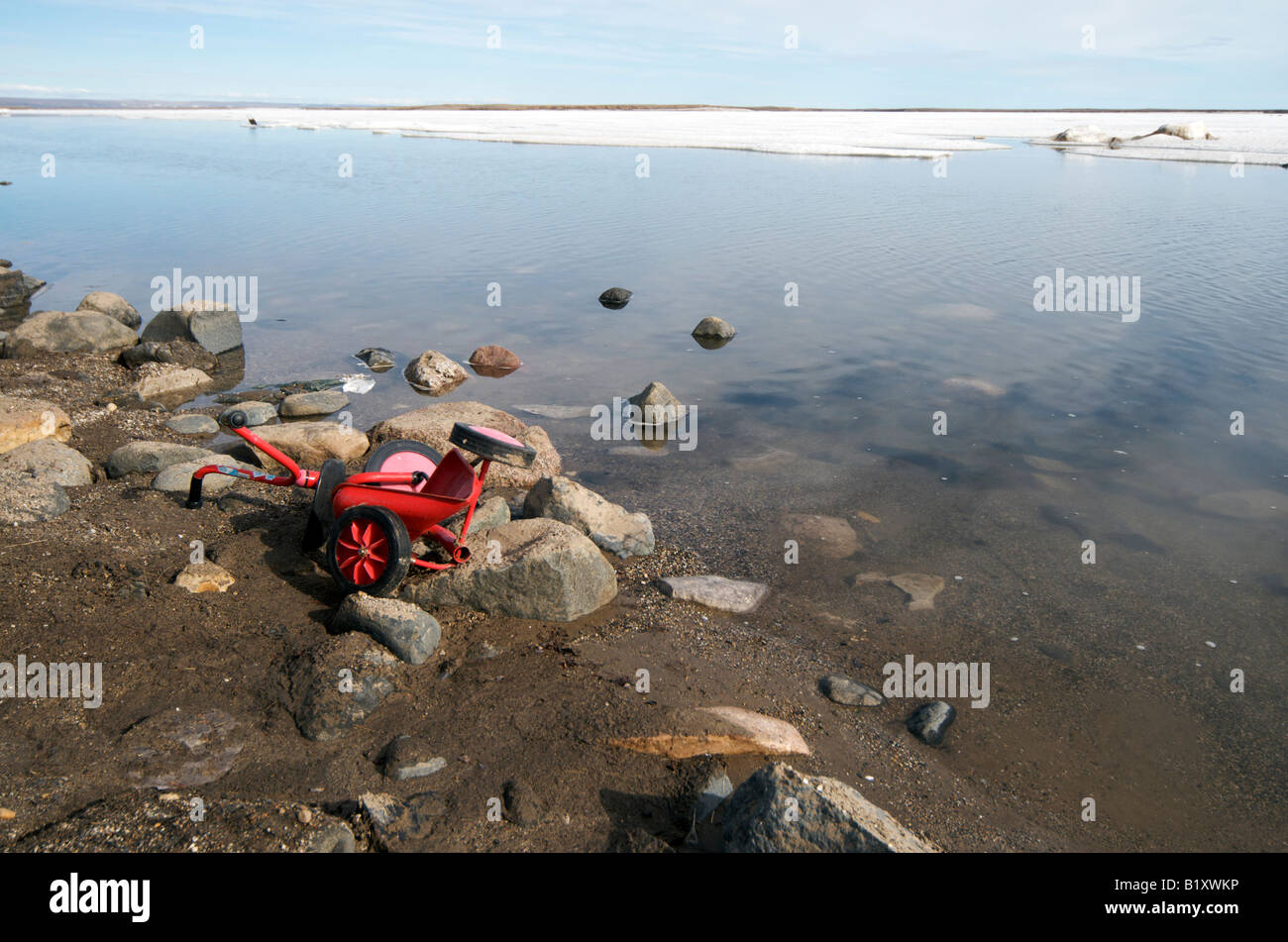 Broken down tricycle trashed on the beach in Sachs Harbour, Banks ...
