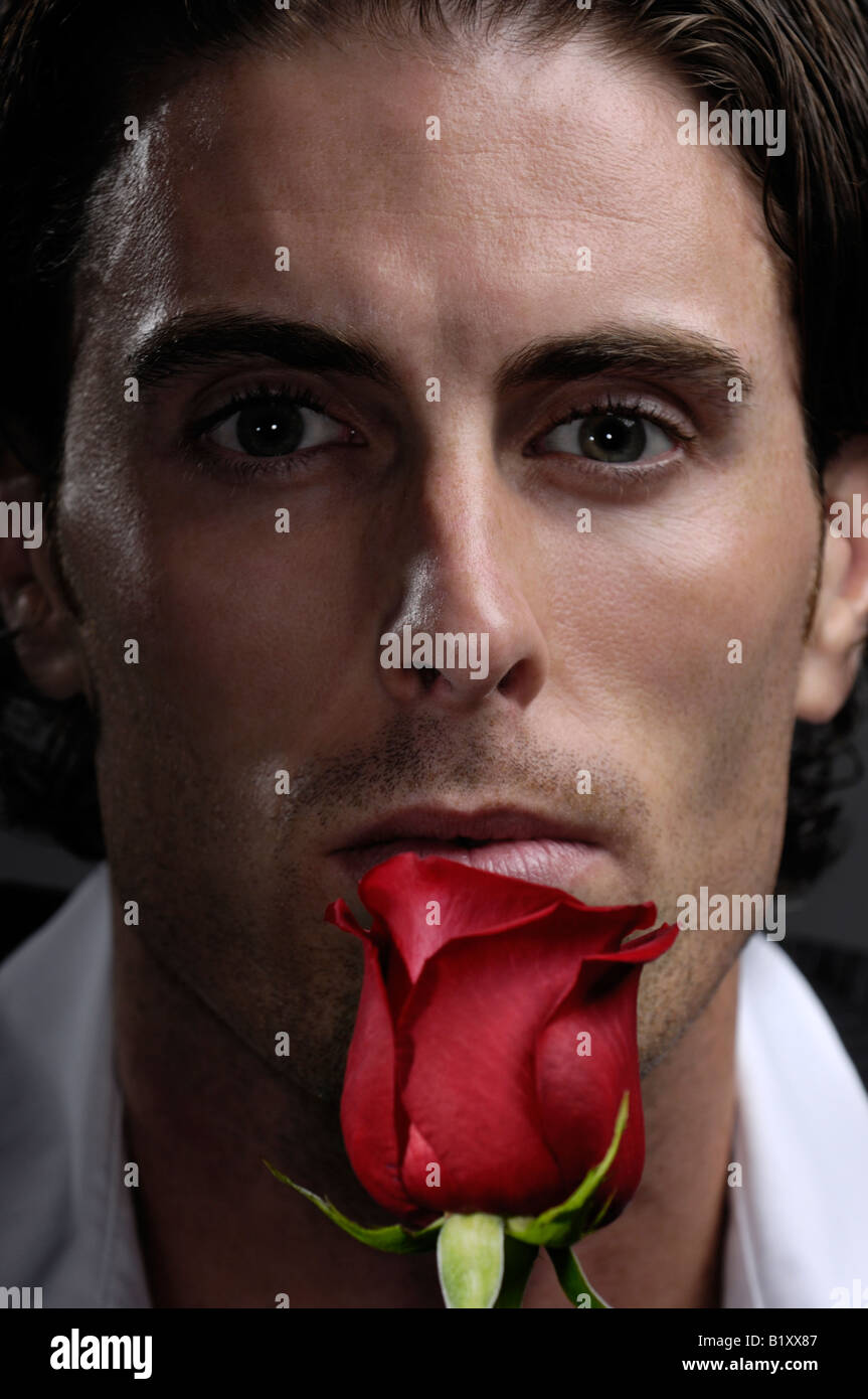 Man with a rose Stock Photo - Alamy