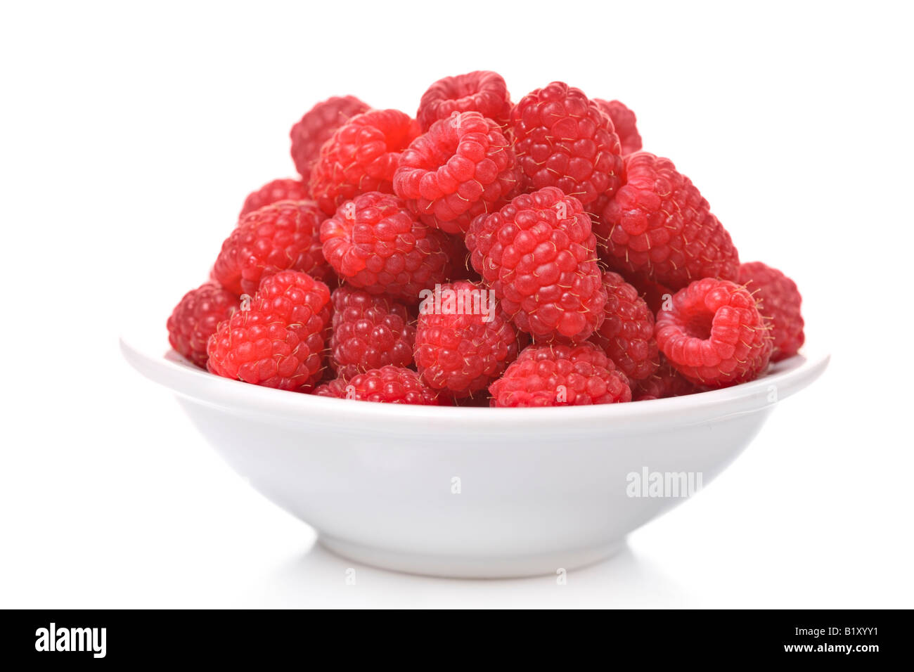 Raspberries in a bowl Stock Photo - Alamy
